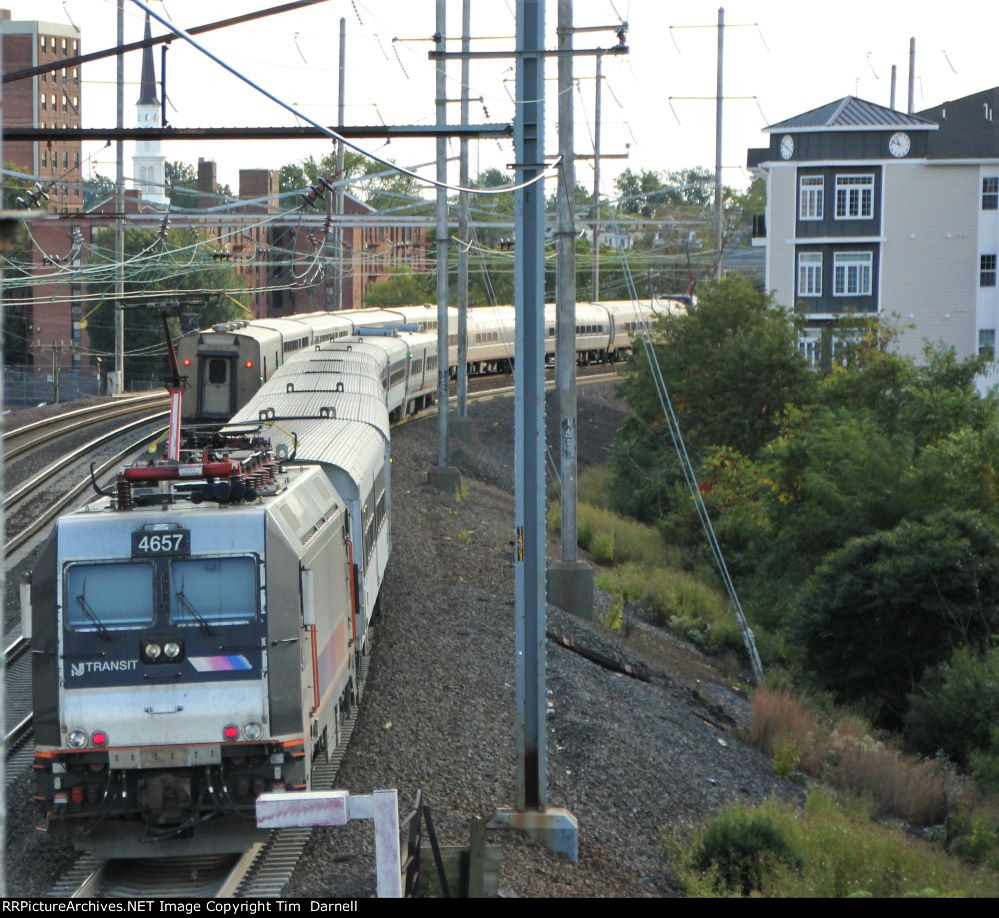 NJT 4657 pushes west next to Amtrak 97